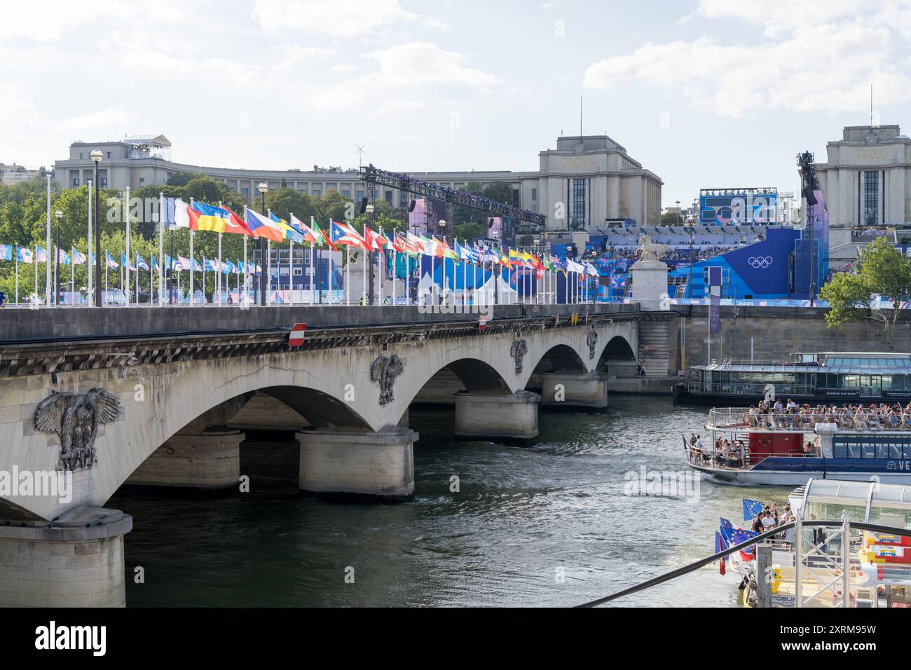 Pont d'Iéna over La Seine in Paris, with national flags flying during ...
