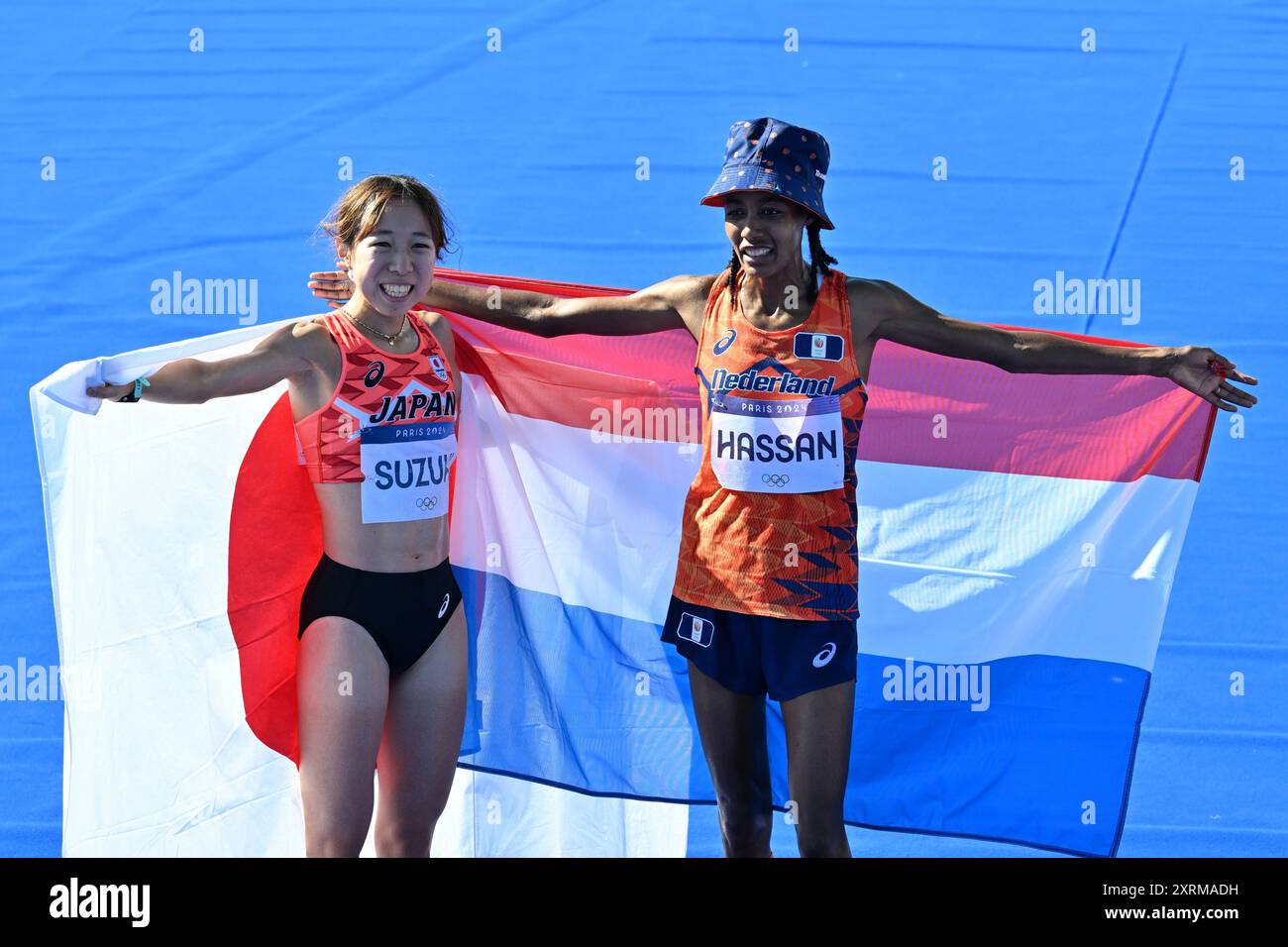 Yuka Suzuki (JPN) and Sifan Hassan (NED) Gold medal, Athletics, Women's Marathon during the ...