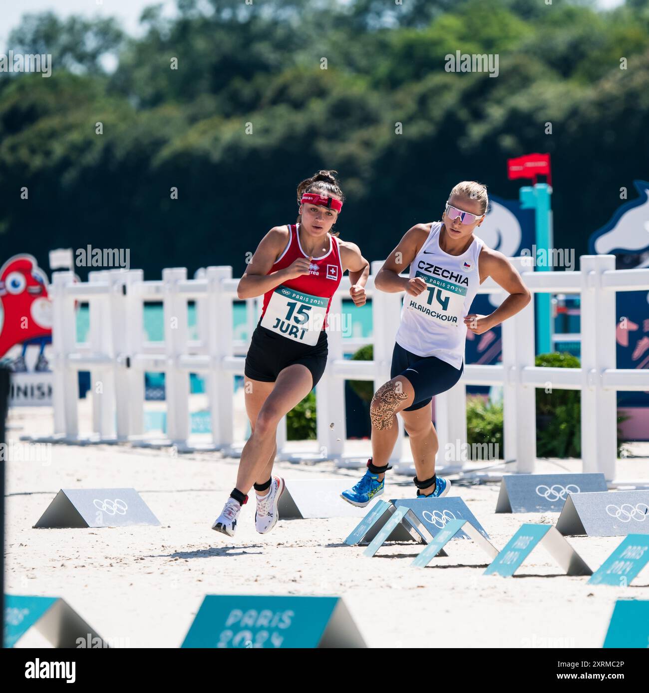 Anna Jurt (SUI), left, and Lucie Hlavackova of Czech Republic competes ...
