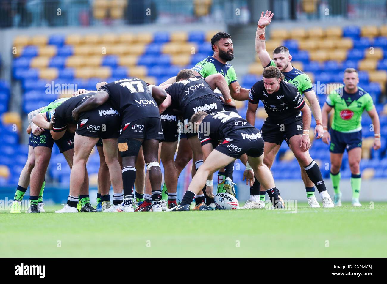 Players form a scrum during the Betfred Super League Round 21 match ...