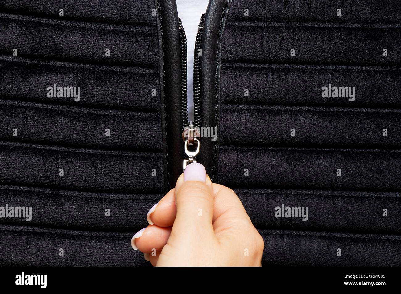 Female hand unzipping black clothes as background,zipper Stock Photo ...