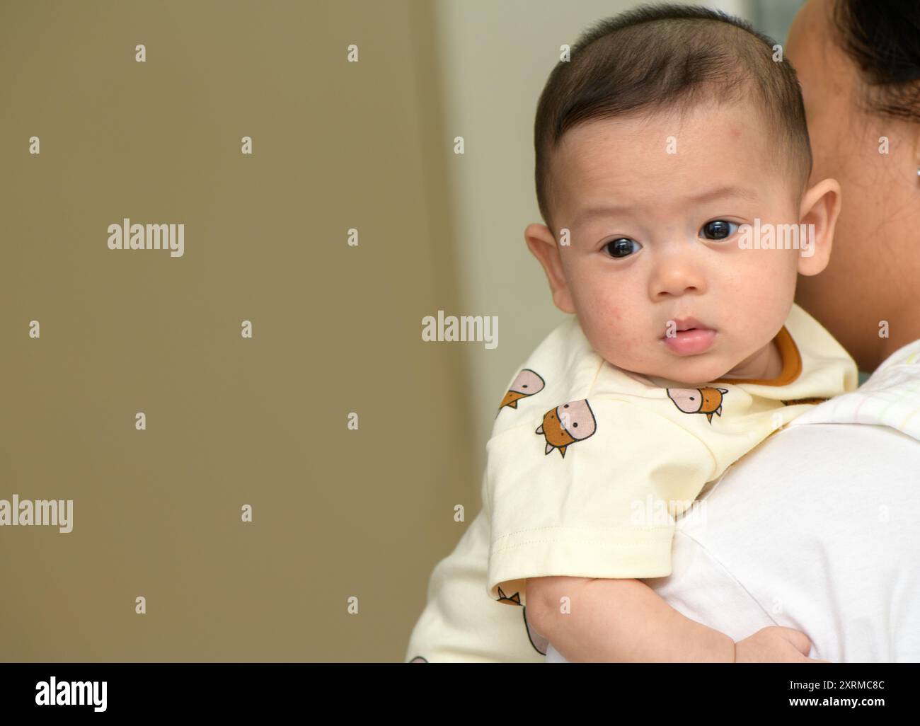 cute cheerful baby in mother hand. emotion infant concept Stock Photo ...