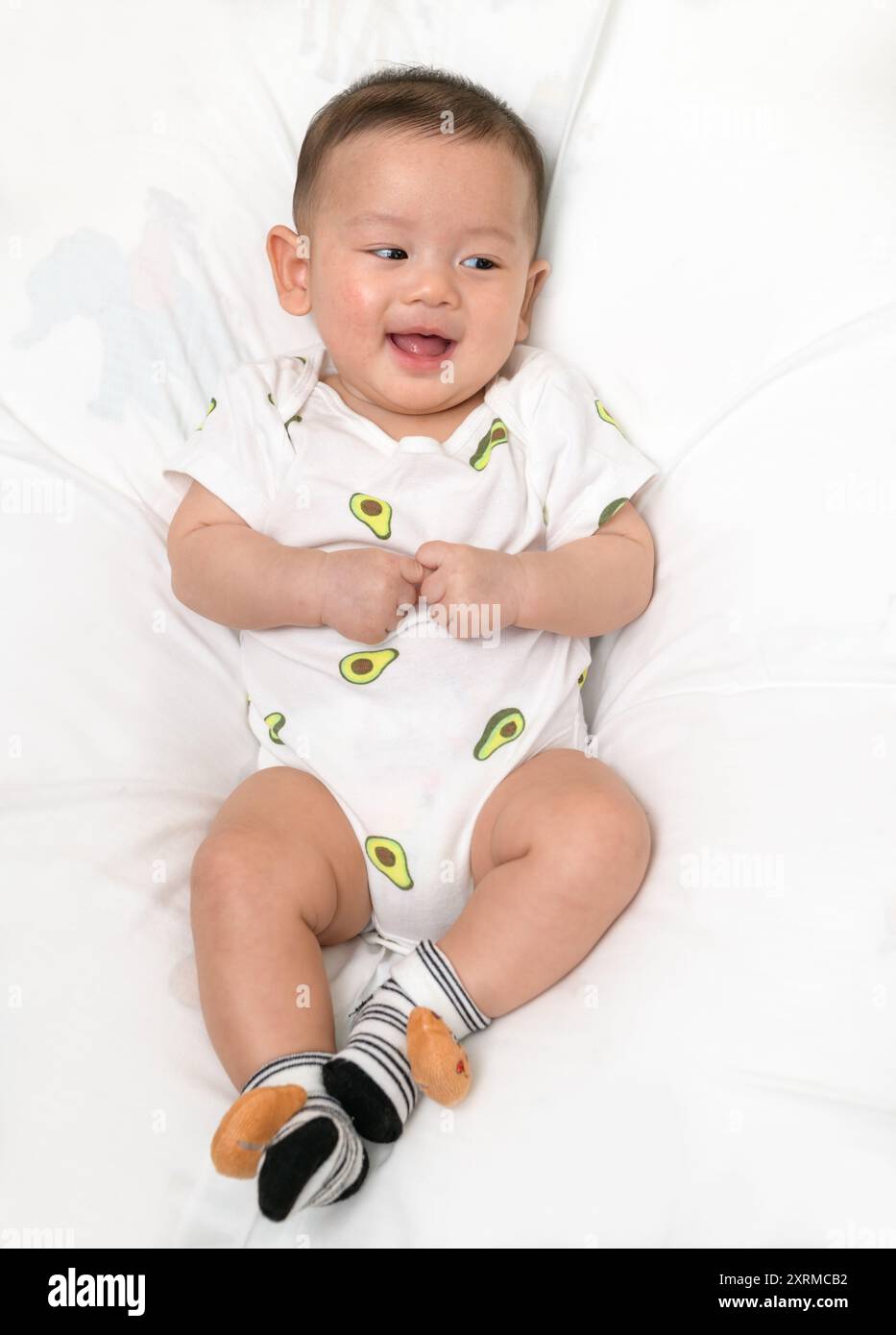 Happy smiling of adorable Asian baby boy on white bed, happy healthy ...