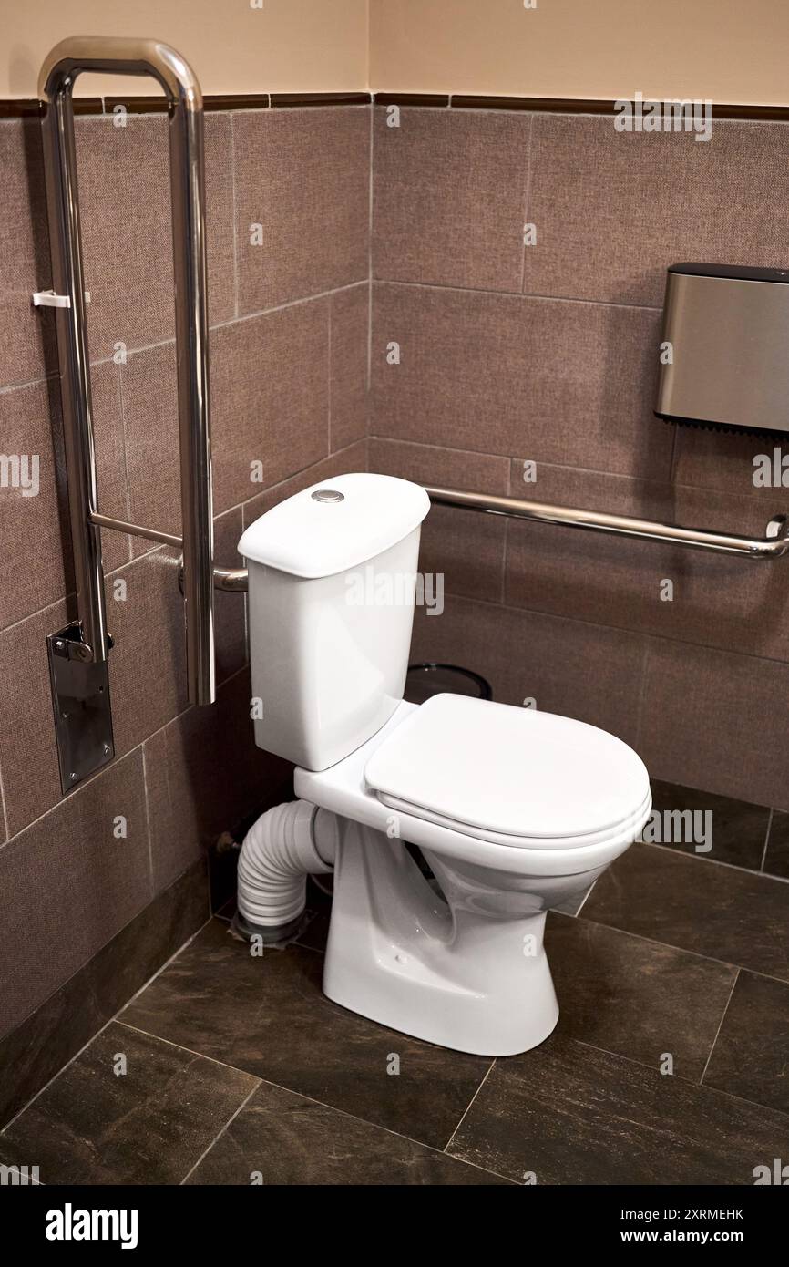 Interior of specially adapted bathroom toilet with friendly design for ...
