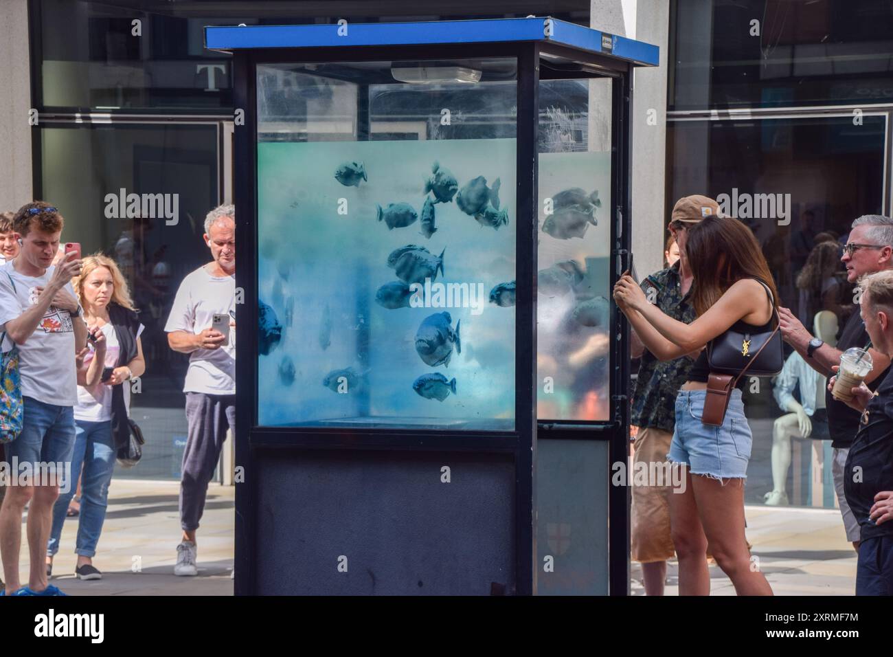 London, UK. 11th August 2024. Crowds gather around the new Banksy ...