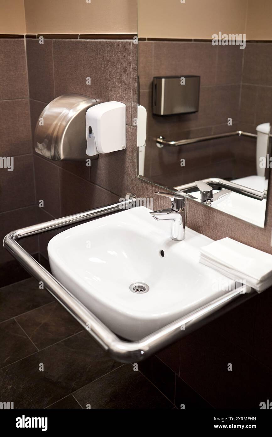 Interior of specially adapted bathroom toilet with friendly design for ...