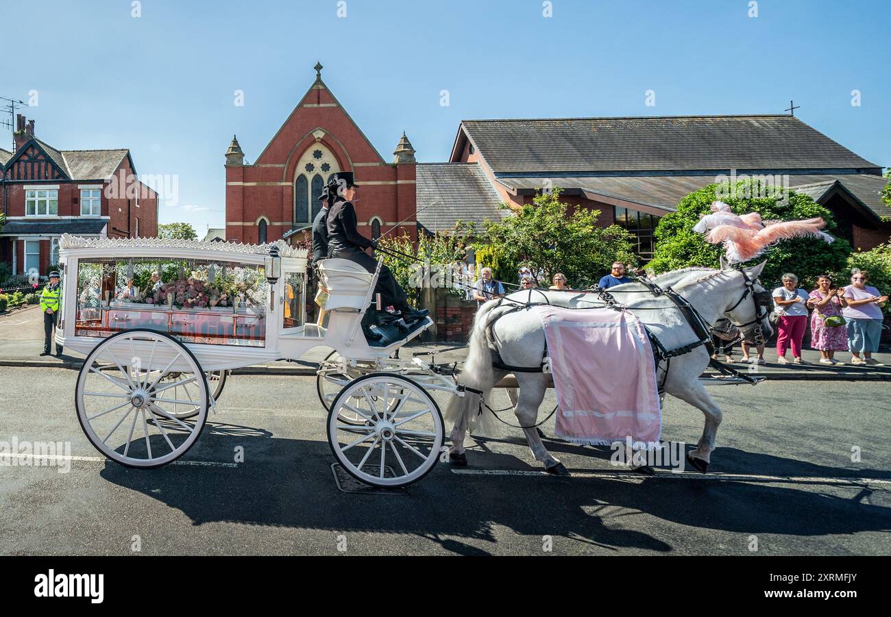 The horse-drawn carriage carrying the coffin of Southport stabbing ...