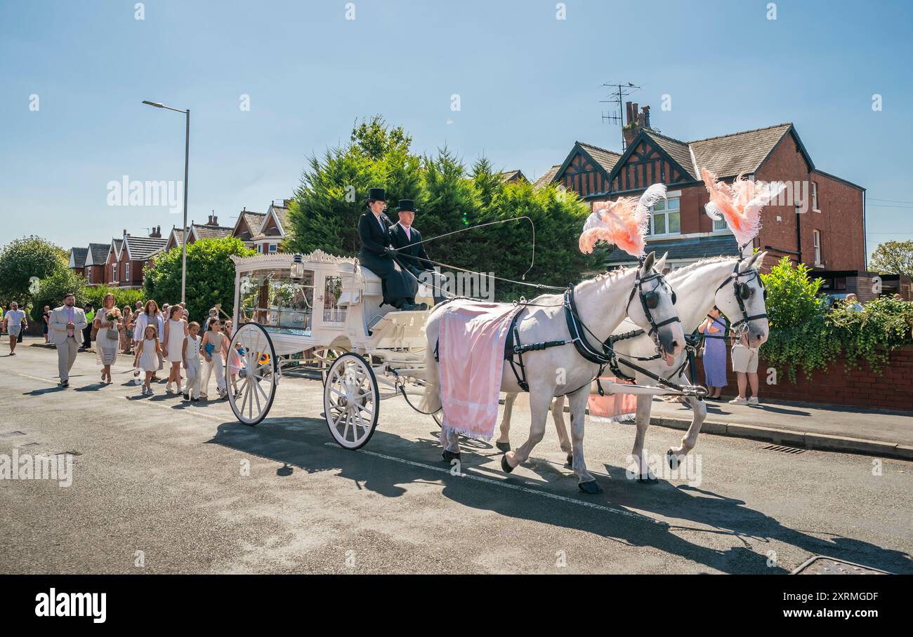 The horse-drawn carriage carrying the coffin of Southport stabbing ...