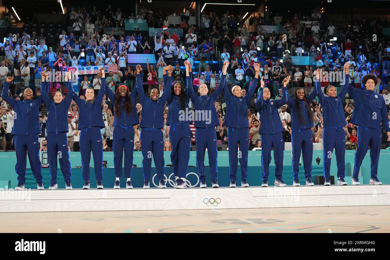 Paris, France. 11th Aug, 2024. Women's Basketball gold medalists Team USA stand on the podium at ...