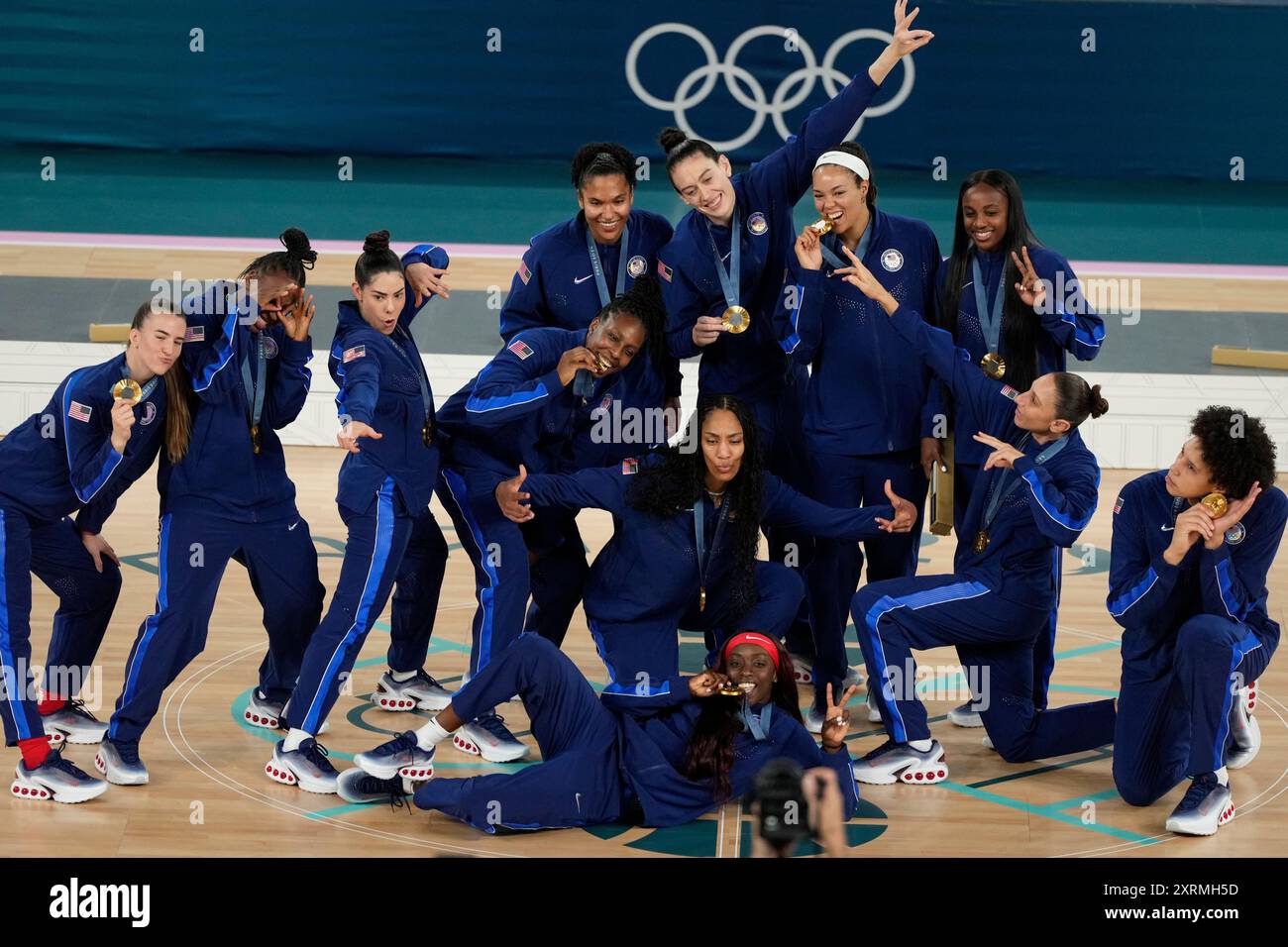 The United States team poses for a picture with their gold medals at ...