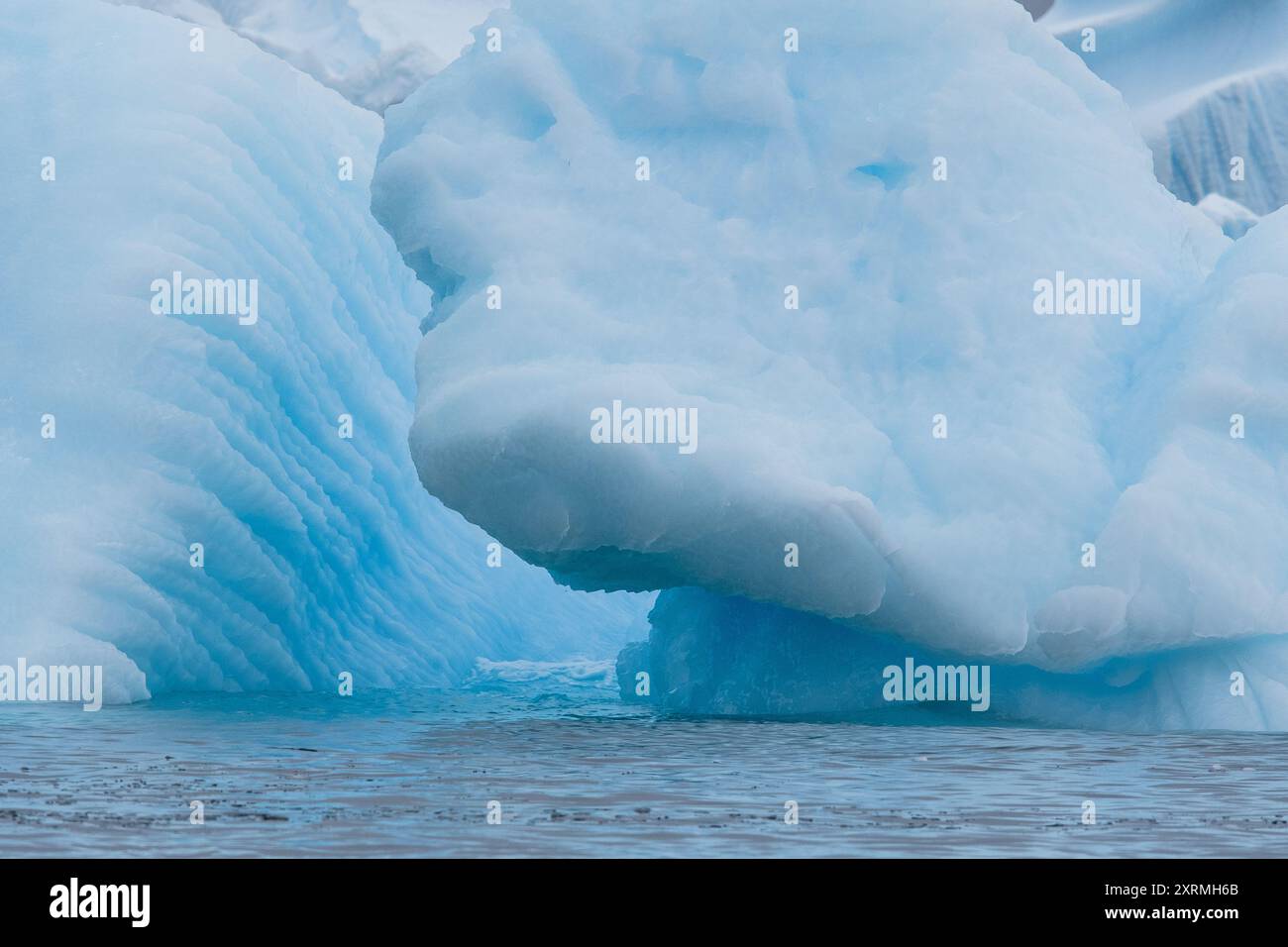 Amazing big blue ice sculpture in Antarctic ocean Stock Photo - Alamy