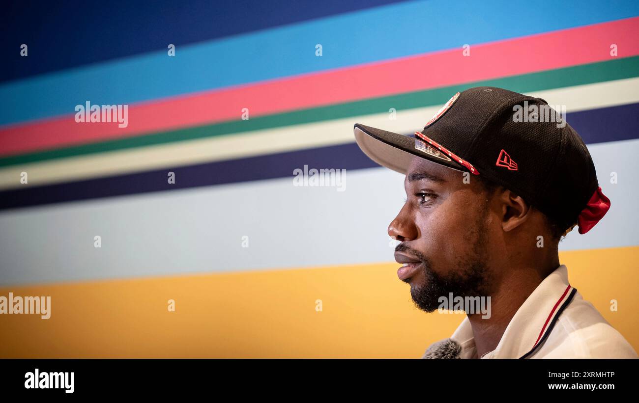 American Olympic champion Noah Lyles speaks before an interview in ...