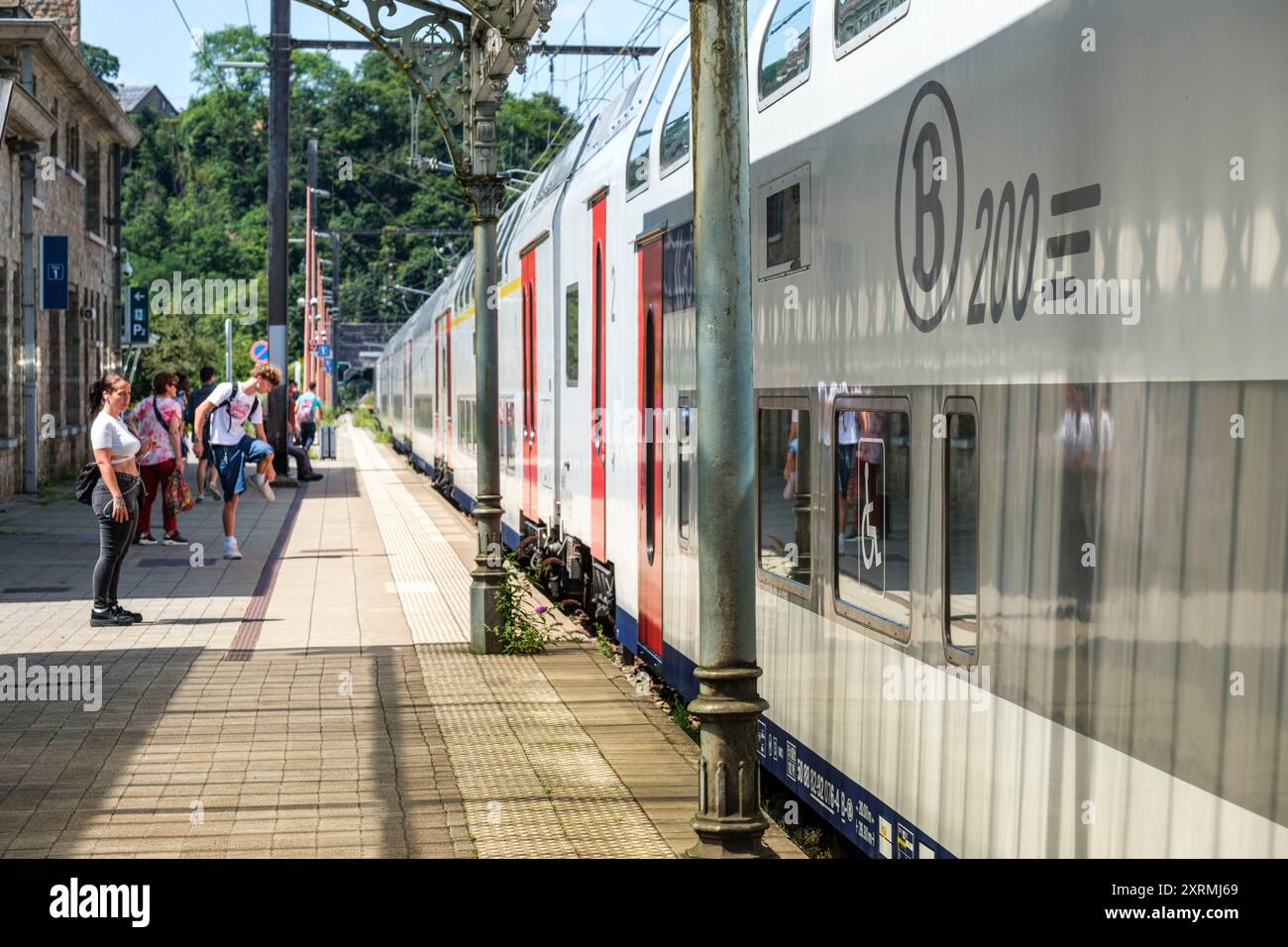 Train station and train along the platform in Pepinster - railway ...