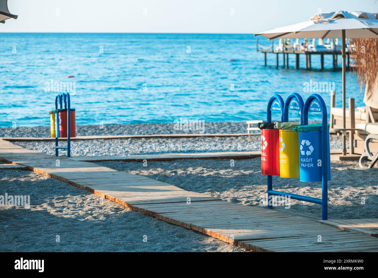 containers, trash bins for separate waste on the beach, waste recycling, environmental ...