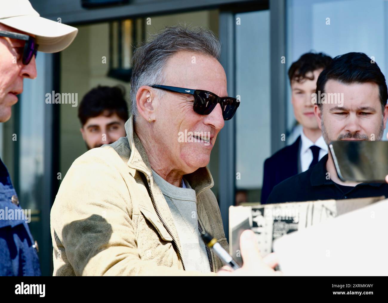 STOCKHOLM, SWEDEN JULY 26, 2024: Bruce Springsteen writing autographs ...