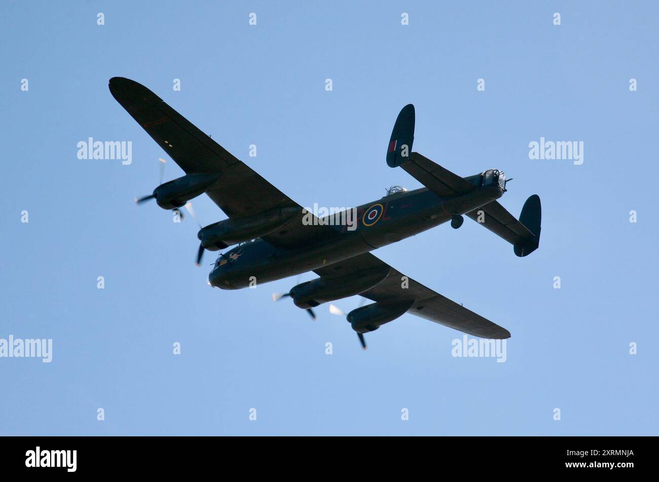 A close up view of the Avro Lancaster Bomber, flying overhead at Lytham ...