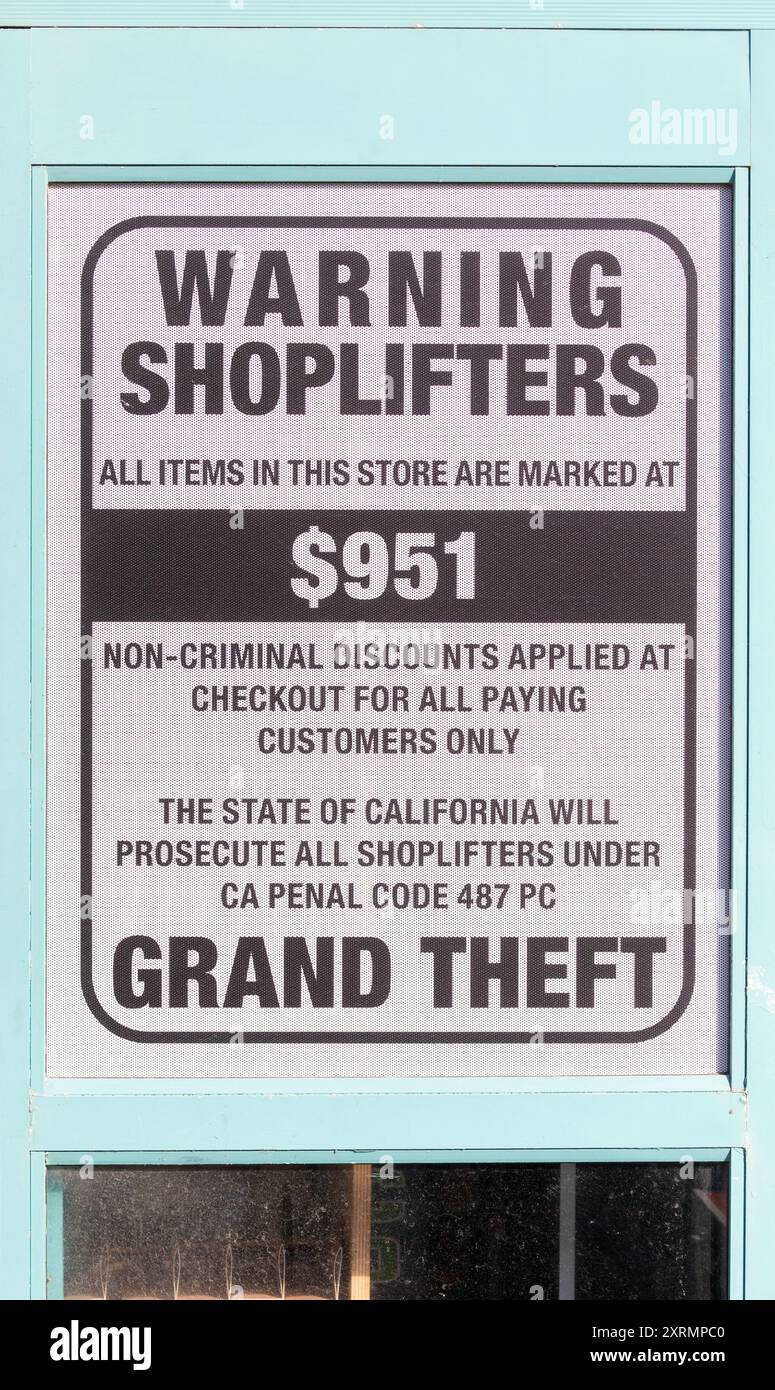 Sign warning shoplifters hi-res stock photography and images - Alamy