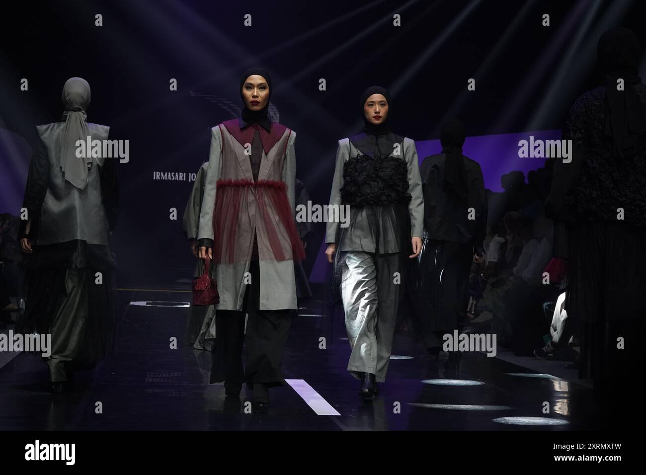 Indonesia. 11th Aug, 2024. A model showcases a design by Irmasari ...