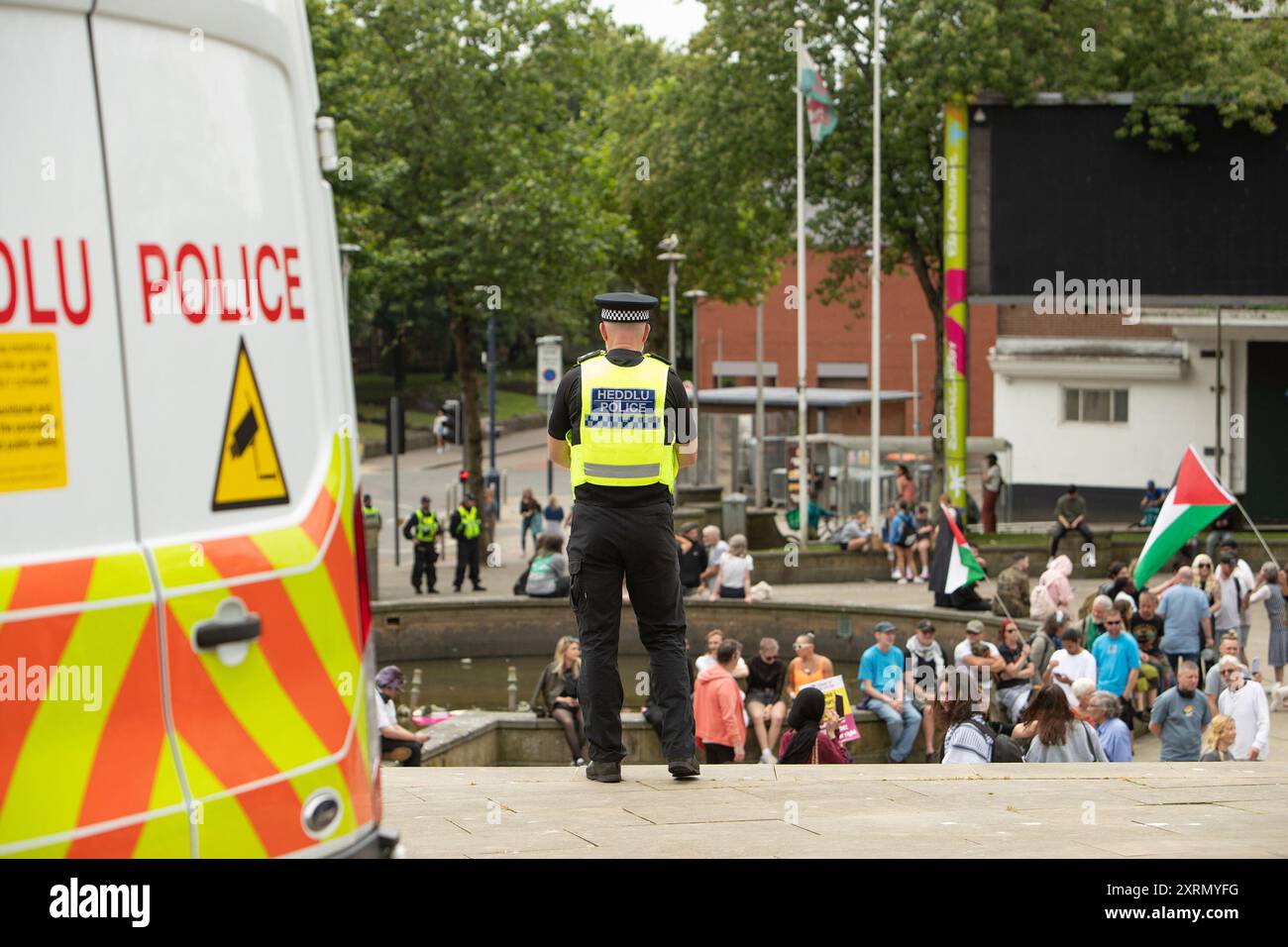 Swansea. Wales. Police watch the crowd at a anti-racist protest ...