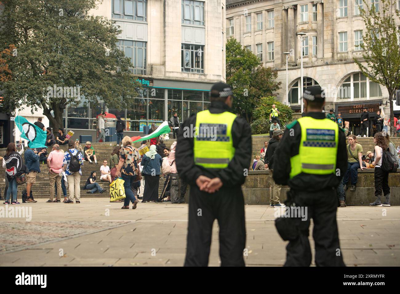 Swansea. Wales. Police watch the crowd at a anti-racist protest ...