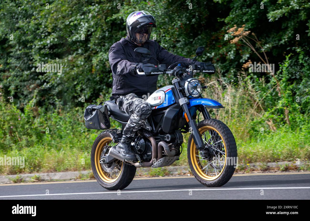 Potterspury,Northants,UK - Aug 11th 2024: Man riding a blue 2021 Ducati ...