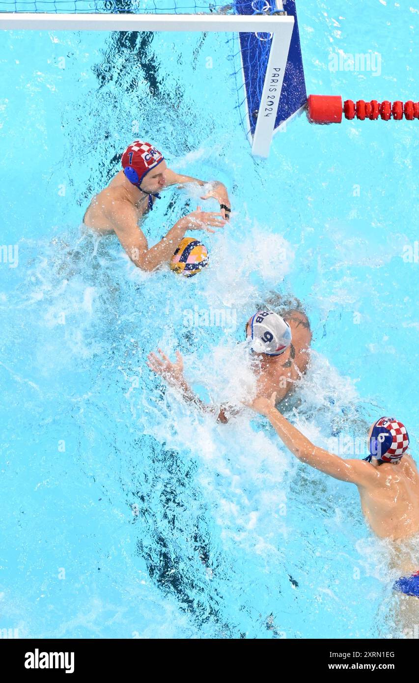 Paris, France. 11th Aug, 2024. Marko Bijac (up) of Croatia and Nemanja ...