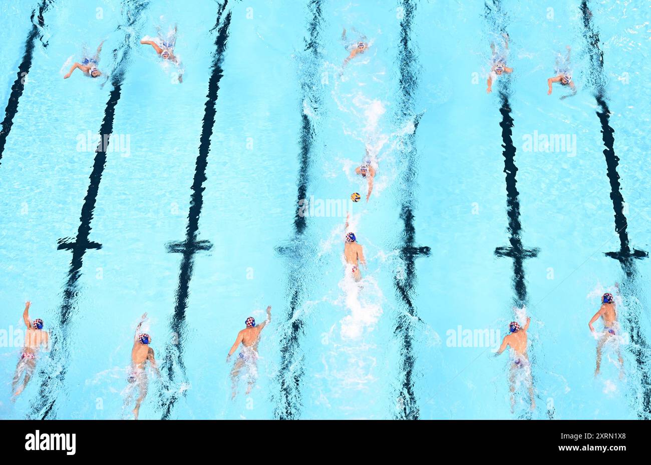Paris, France. 11th Aug, 2024. Players compete during the water polo ...