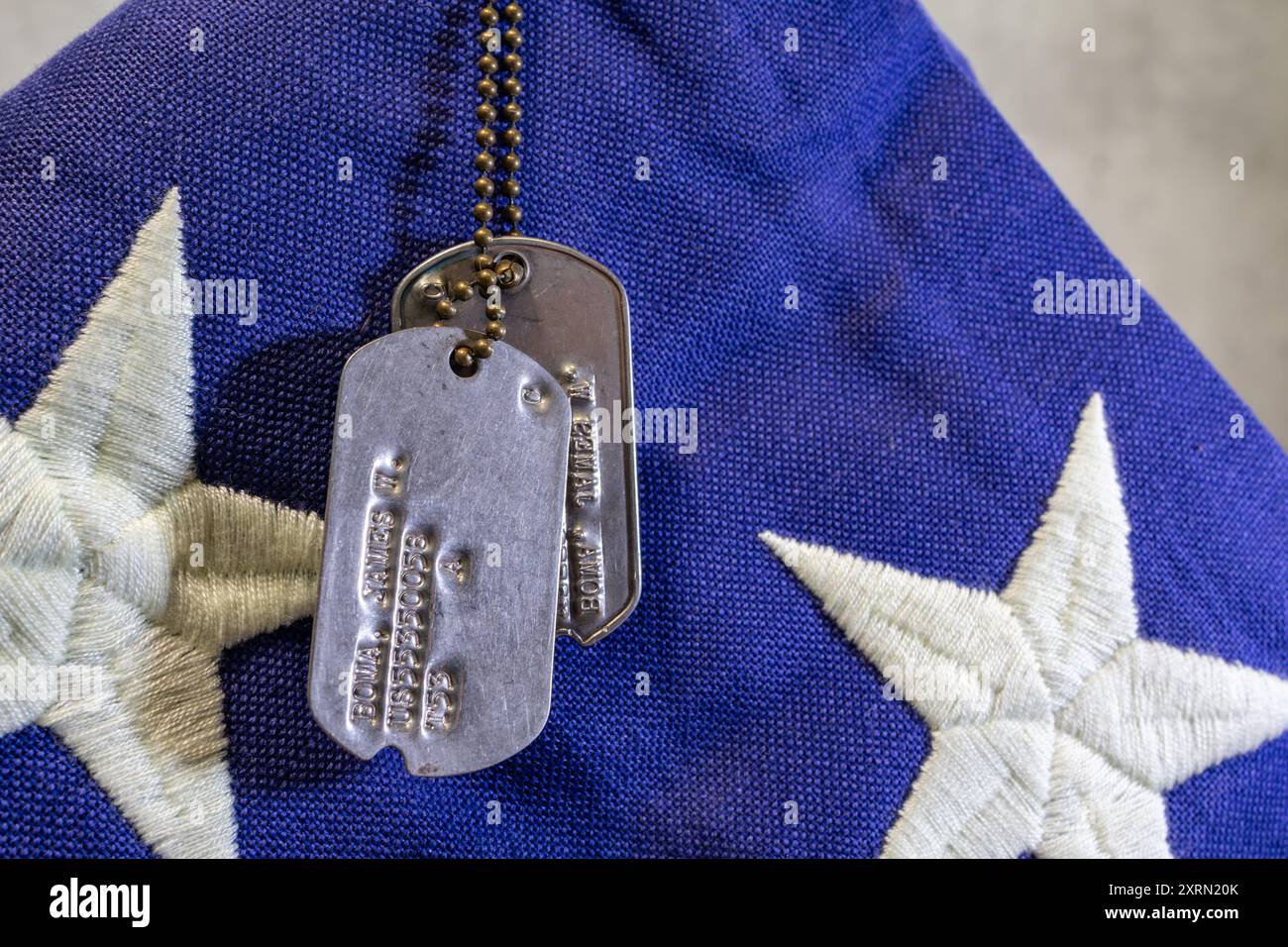 Everett WA USA Aug 7, 2024 - Korean War era dog tags on an American ...