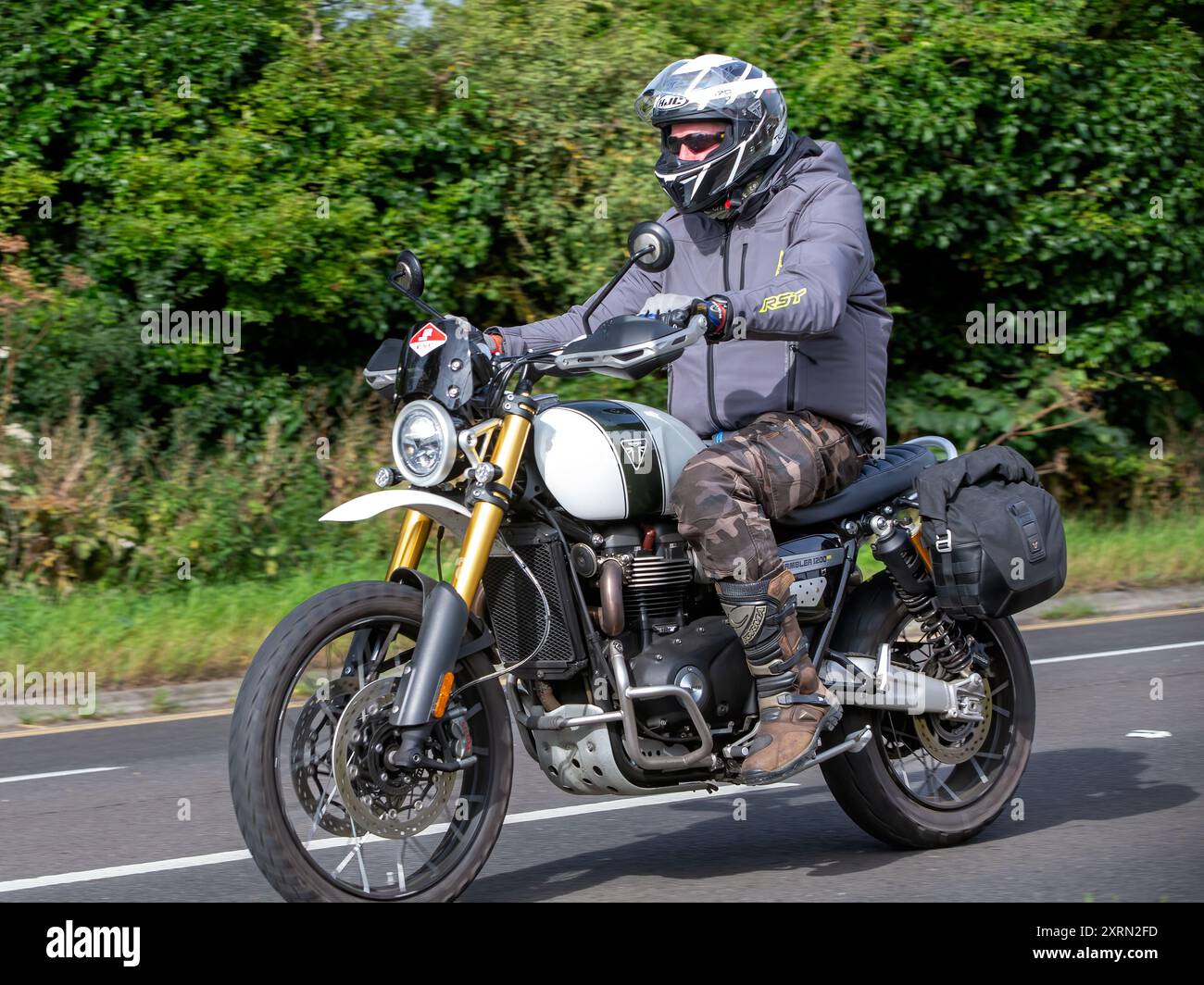 Potterspury,Northants,UK - Aug 11th 2024: man riding a Triumph ...