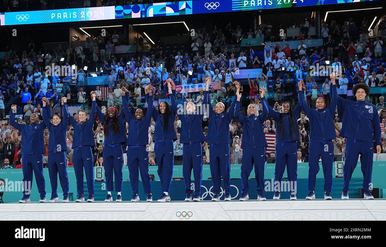 Paris, France. 11th Aug, 2024. Gold medalists team USA attend the victory ceremony for the women ...