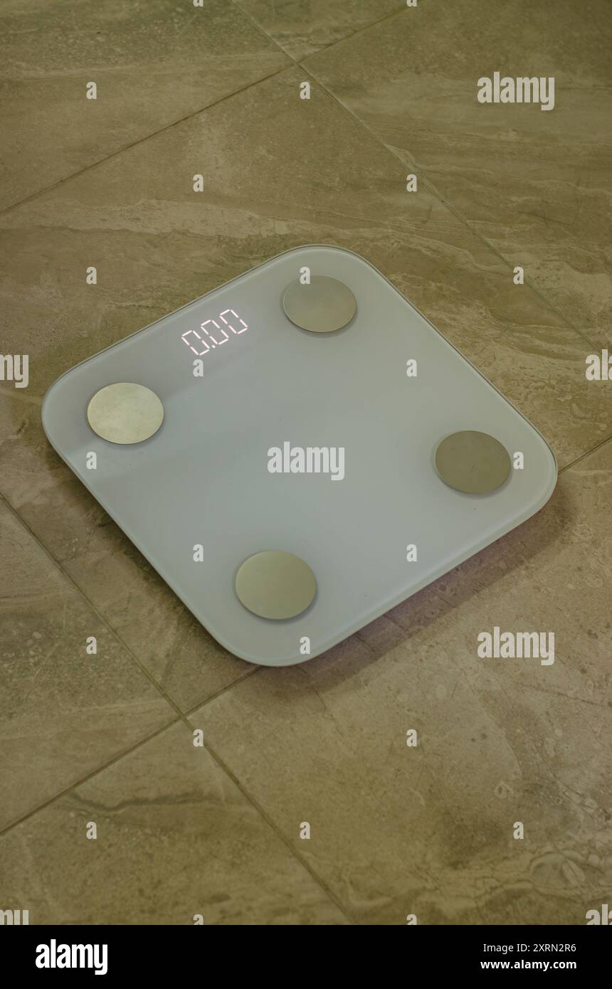 white floor scales on marble floor . High quality photo Stock Photo - Alamy