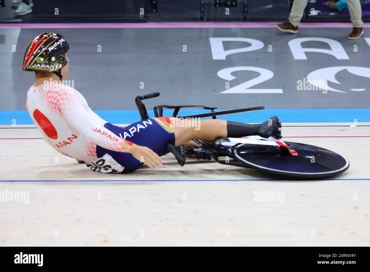 PARIS, FRANCE - AUGUST 11: Shinji Nakano of Team Japan crashes in the ...