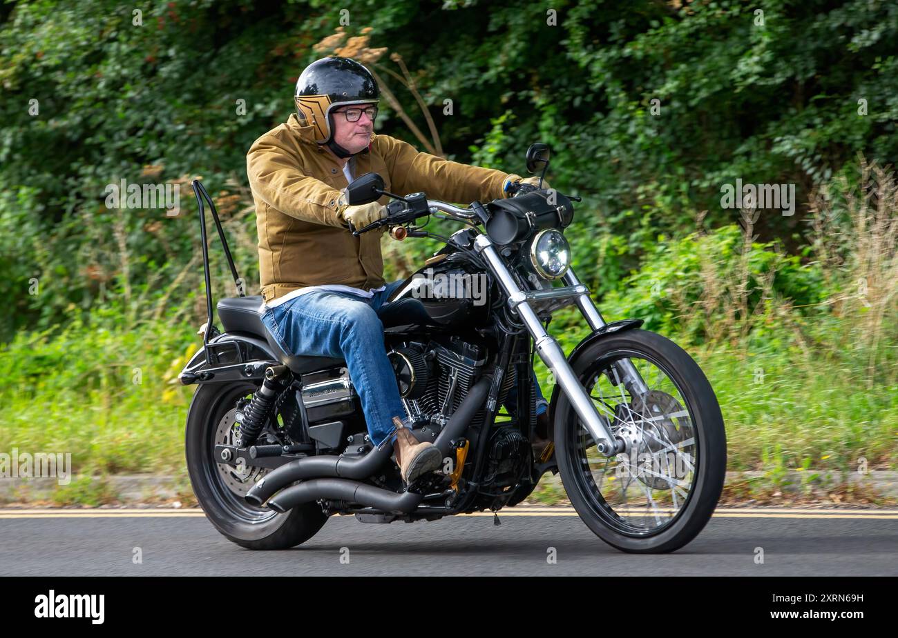 Potterspury,Northants,UK - Aug 11th 2024: Man riding a Harley Davidson ...