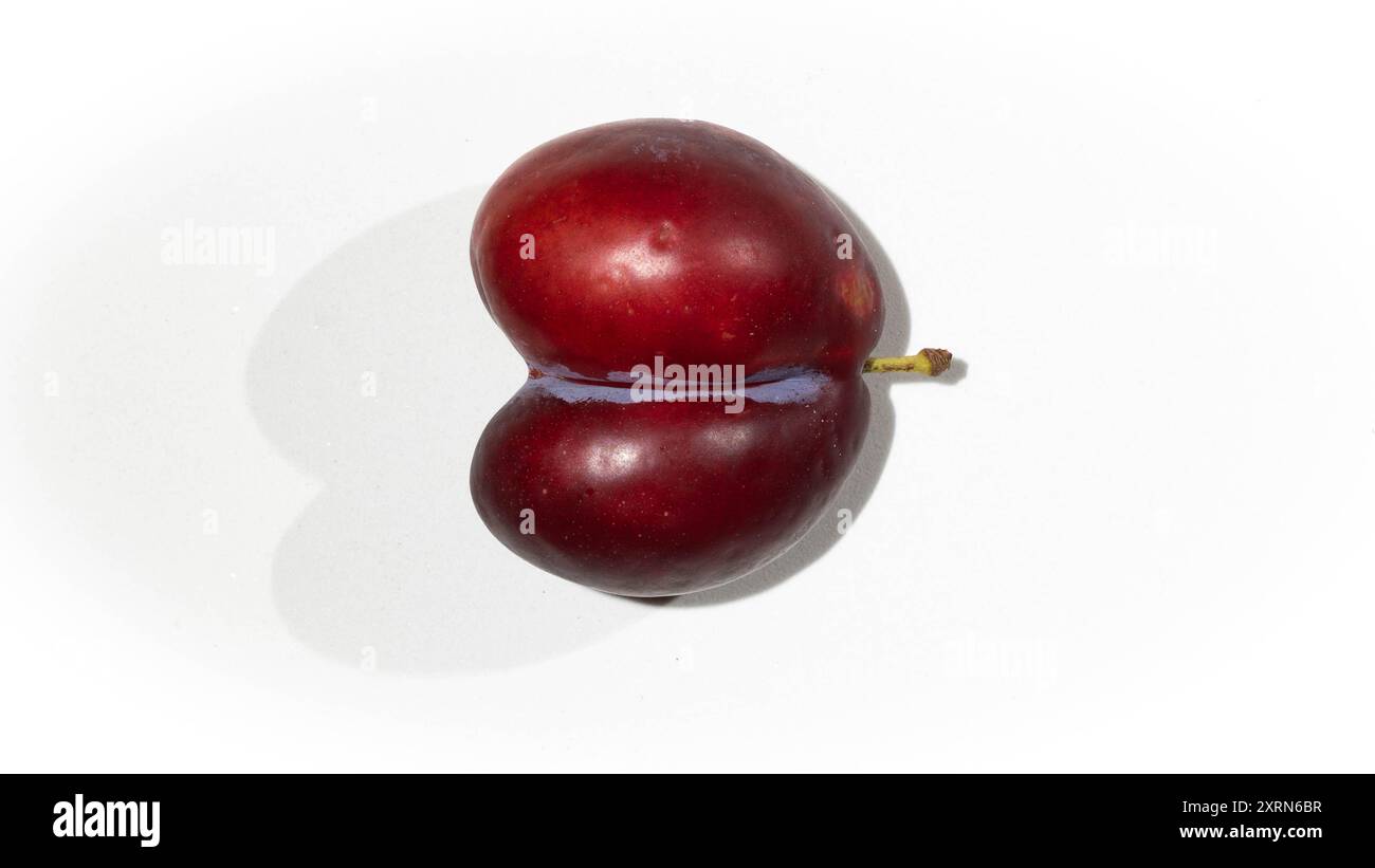 Two fruits in one on white background Stock Photo - Alamy