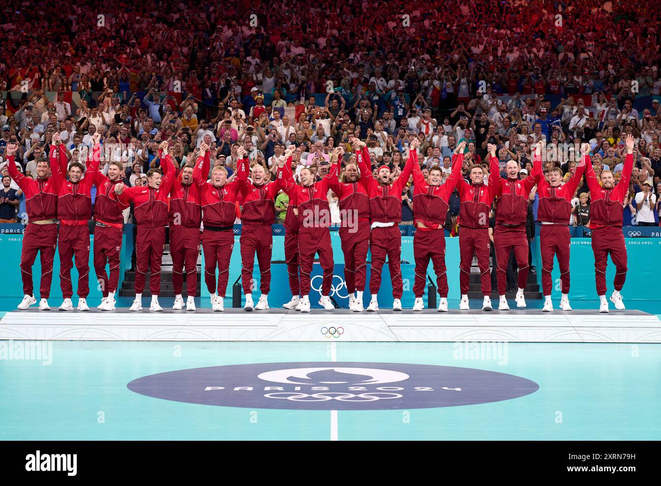 Lille, France. 11th Aug, 2024. Gold medalists team Denmark react during ...