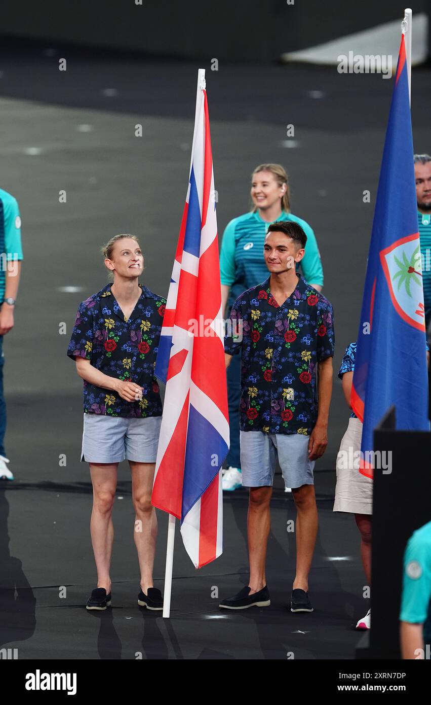 Great Britain’s Flagbearers Alex Yee (right) and Bryony Page during the ...