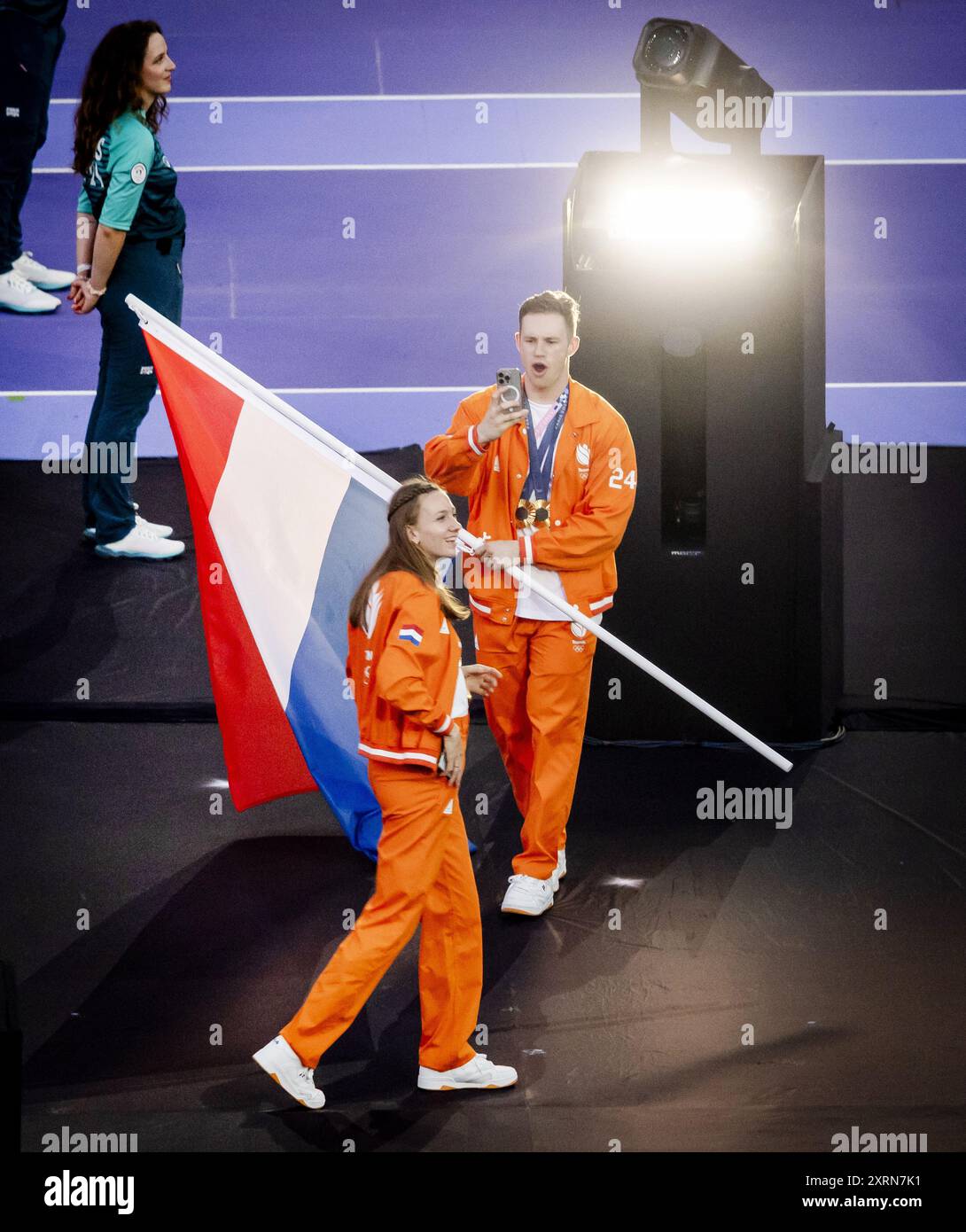 PARIS - Athlete Femke Bol and track cyclist Harrie Lavreysen carry the ...