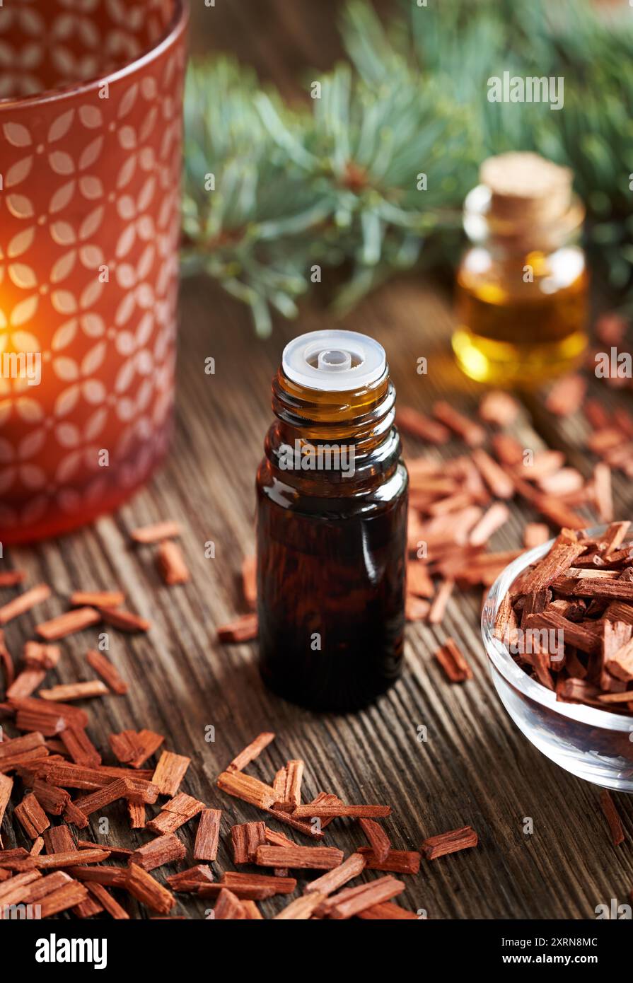 Red sandalwood oil in a brown glass bottle Stock Photo - Alamy