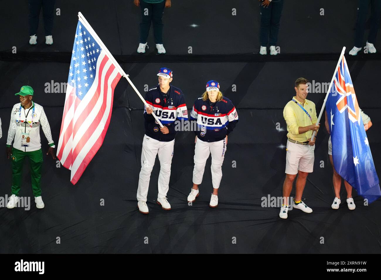 USA flag bearers Katie Ledecky (centre right) and Nick Mead during the ...