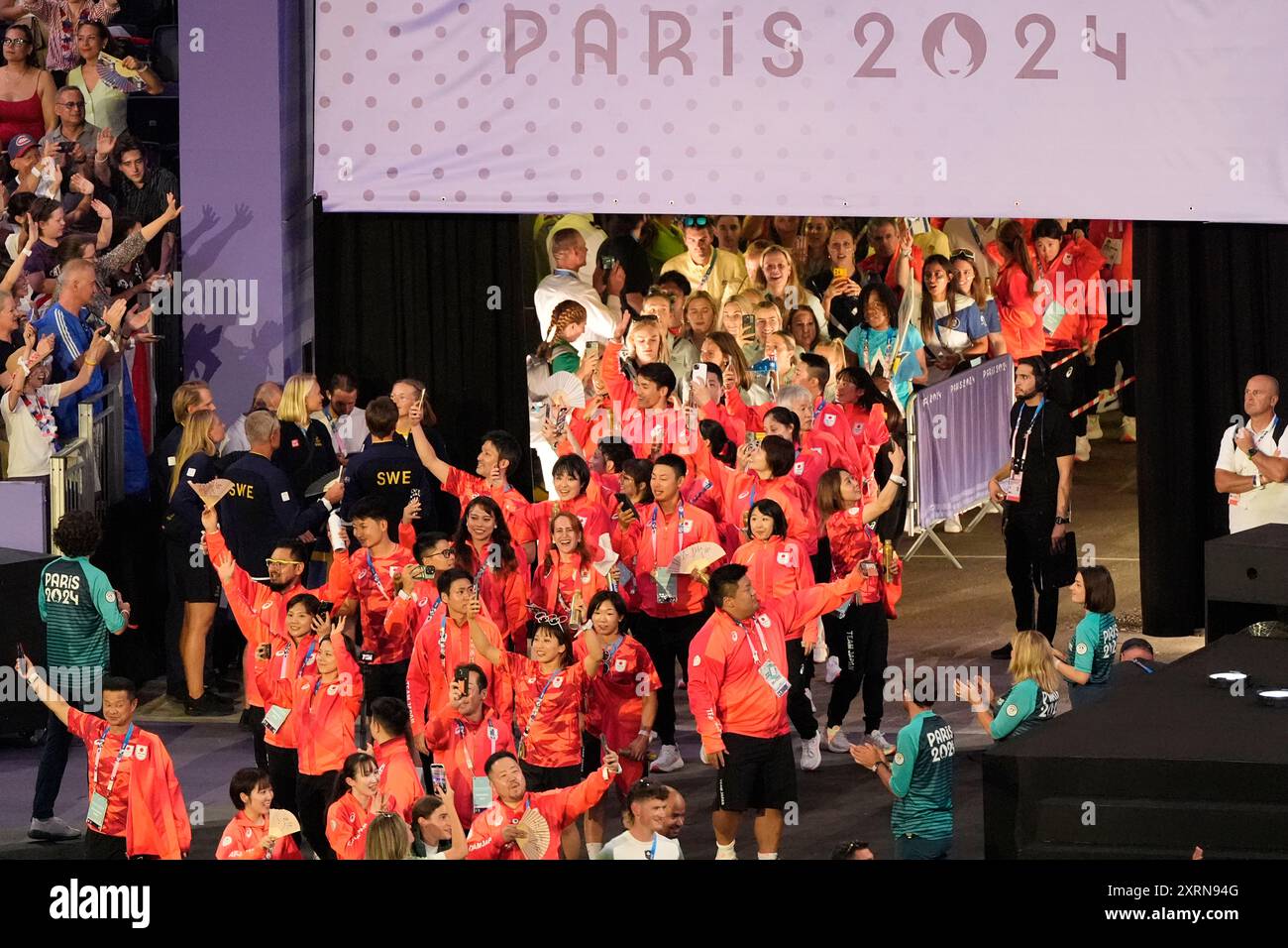 Japanese athletes arrive during the 2024 Summer Olympics closing ...