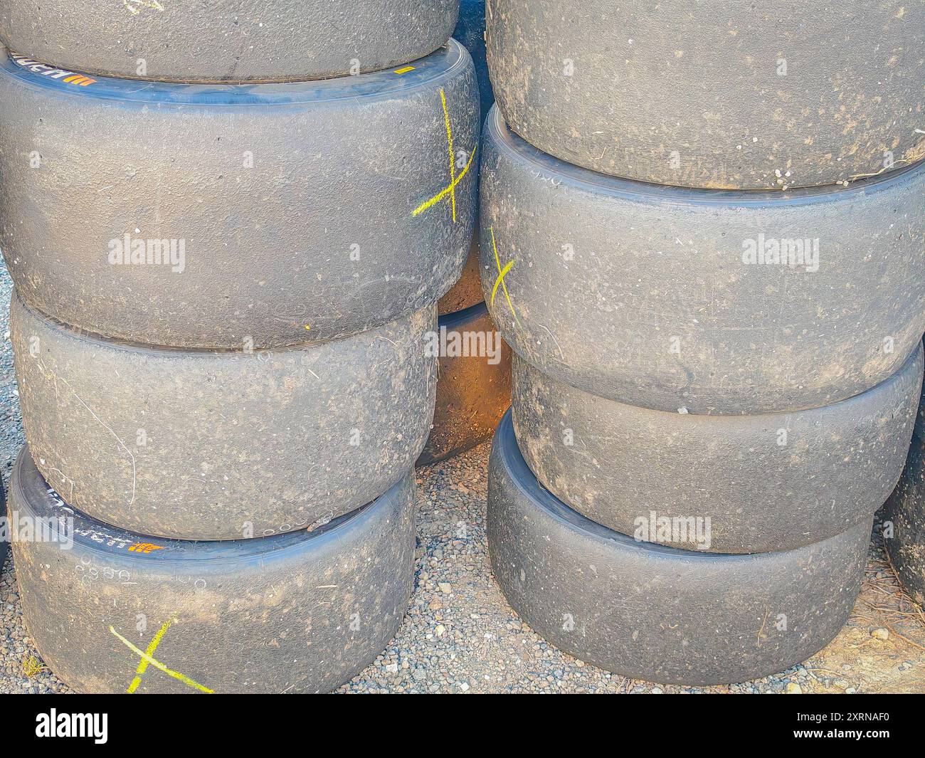 Used race car tires stacked in a pile. Tires for circuit racing Stock ...