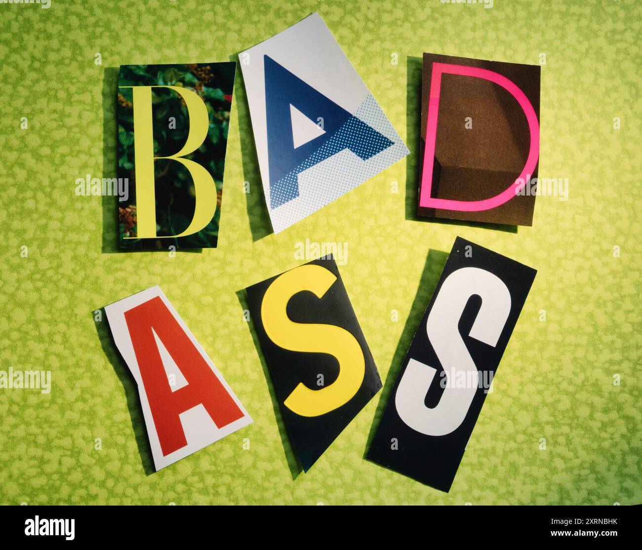 The concept "Bad Ass" spelled out in ransom note style typography, USA ...