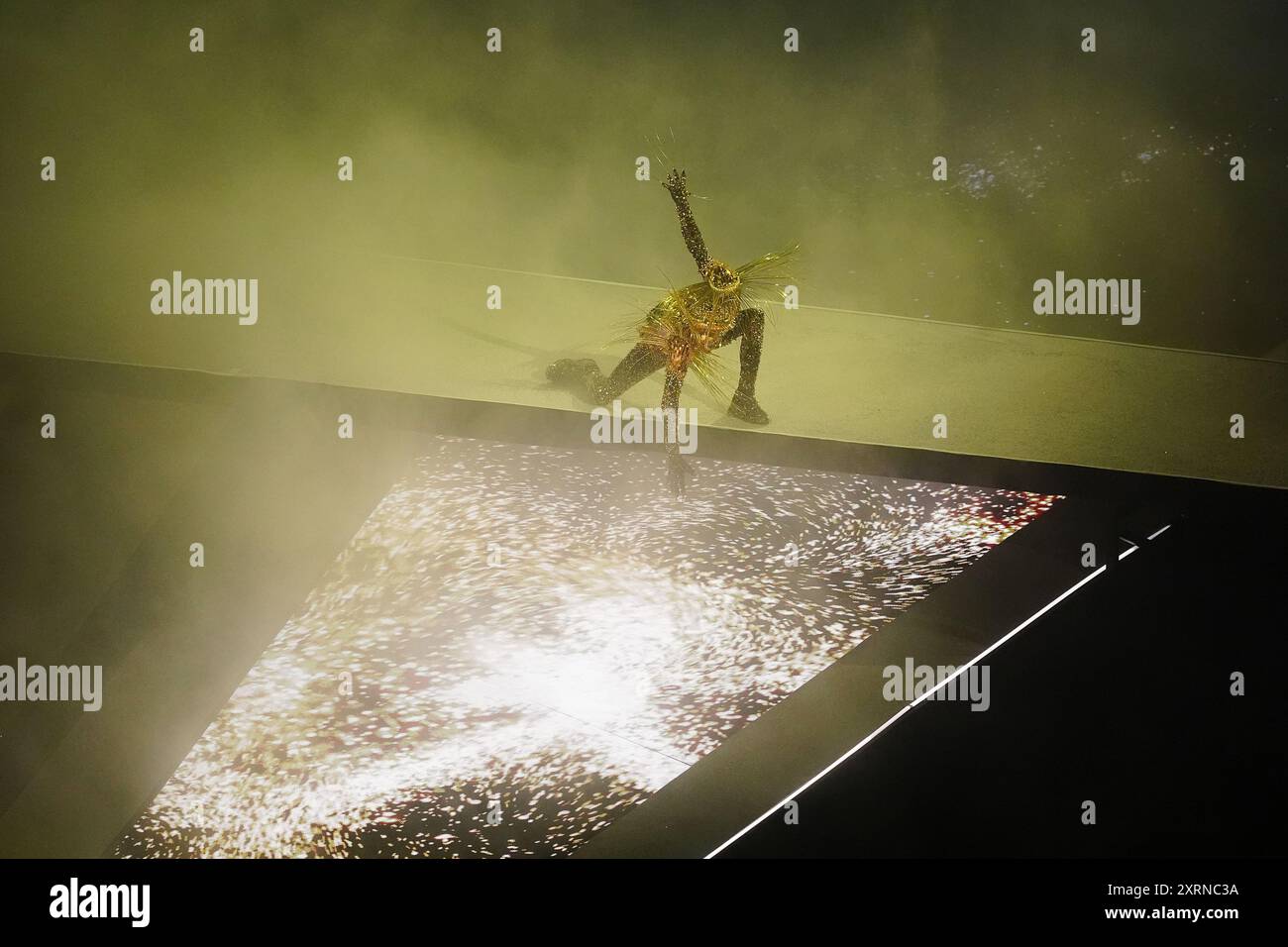 A performer on stage during the closing ceremony of the 2024 Paris ...