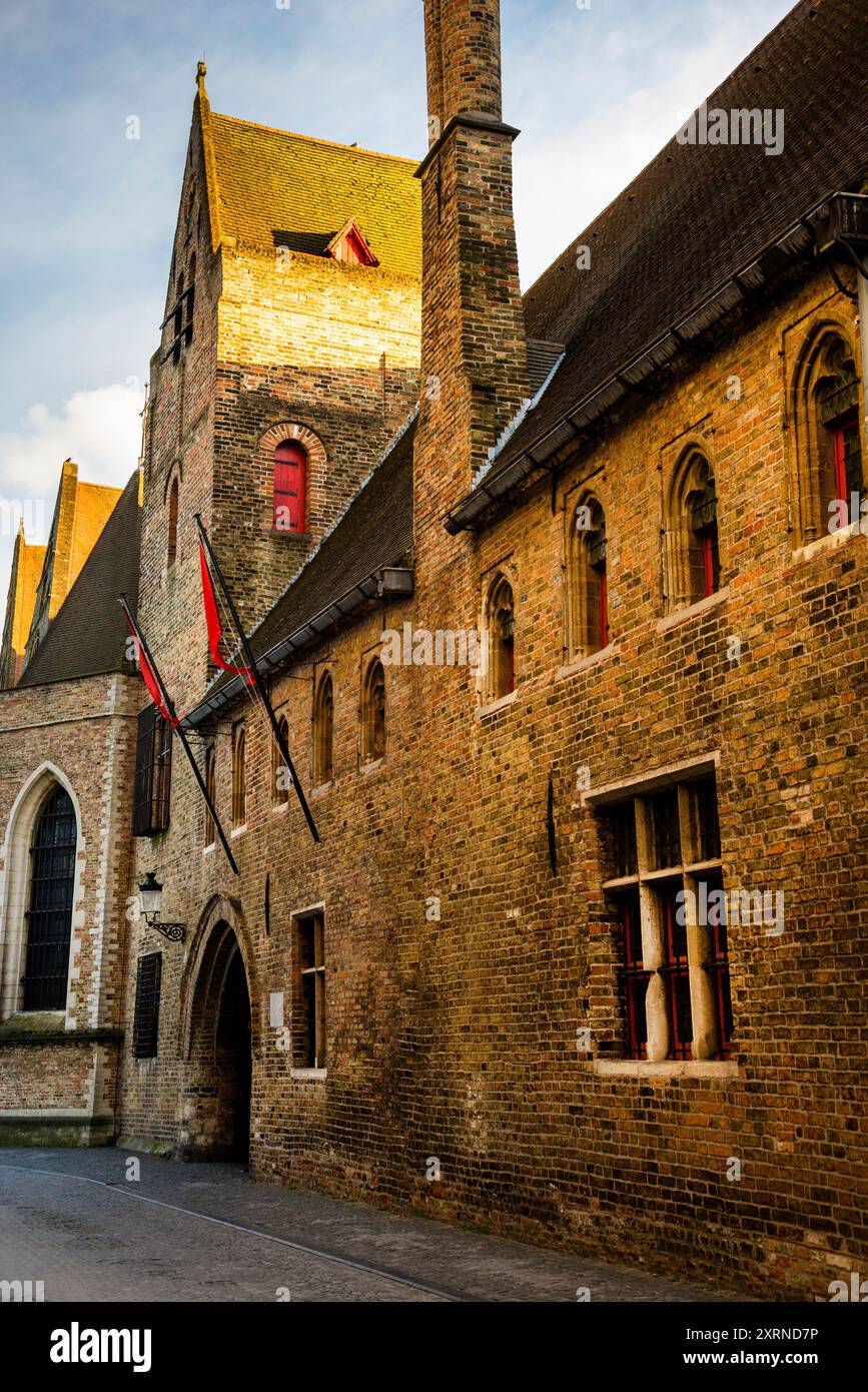 Gothic architrave entrance to St. John's Hospital in Bruges, Belgium ...