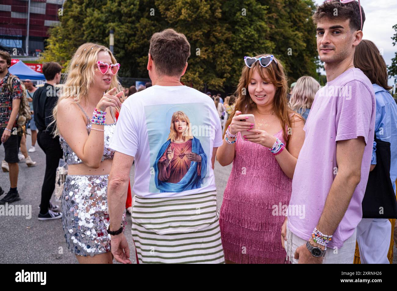 Fans of Taylor Swift gather outside the stadium before the concert ...