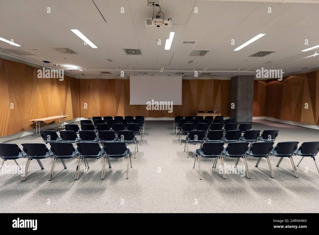 Large presentation screen in modern conference hall. Large presentation ...