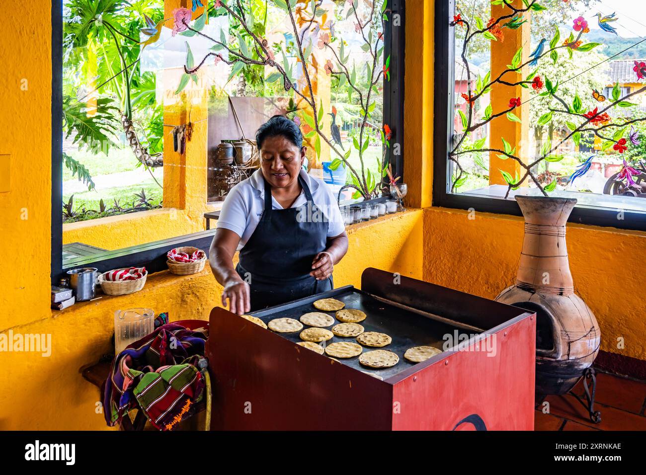 A Guatemalan woman hand making corn tortillas. Guatemala Stock Photo ...