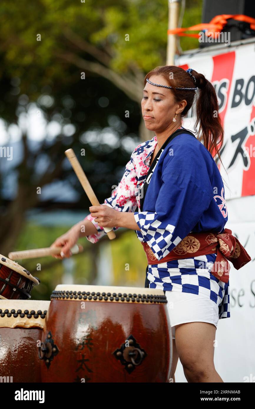 Cairns, Australia. 10th Aug, 2024. A woman plays the drums during the Cairns Japan Bon Dance ...