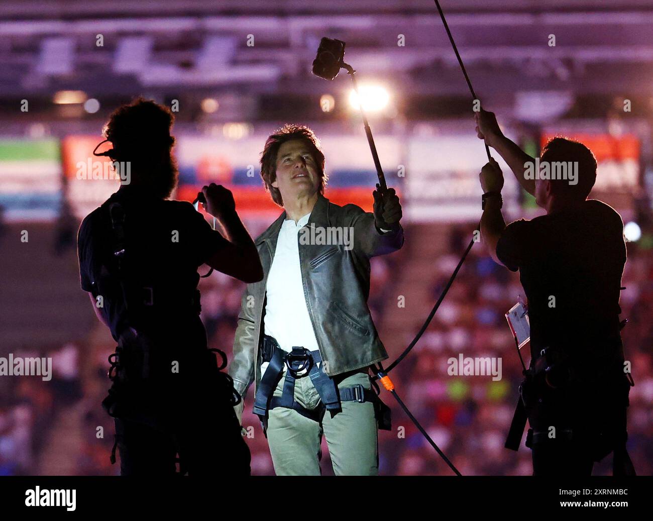 Actor Tom Cruise takes a selfie on the roof of the Stade de France ...
