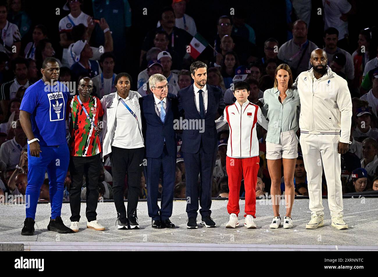 Paris, France. 11th Aug, 2024. (L to R)Mijain Lopez Nunez of Cuba, Eliud Kipchoge of Kenya ...